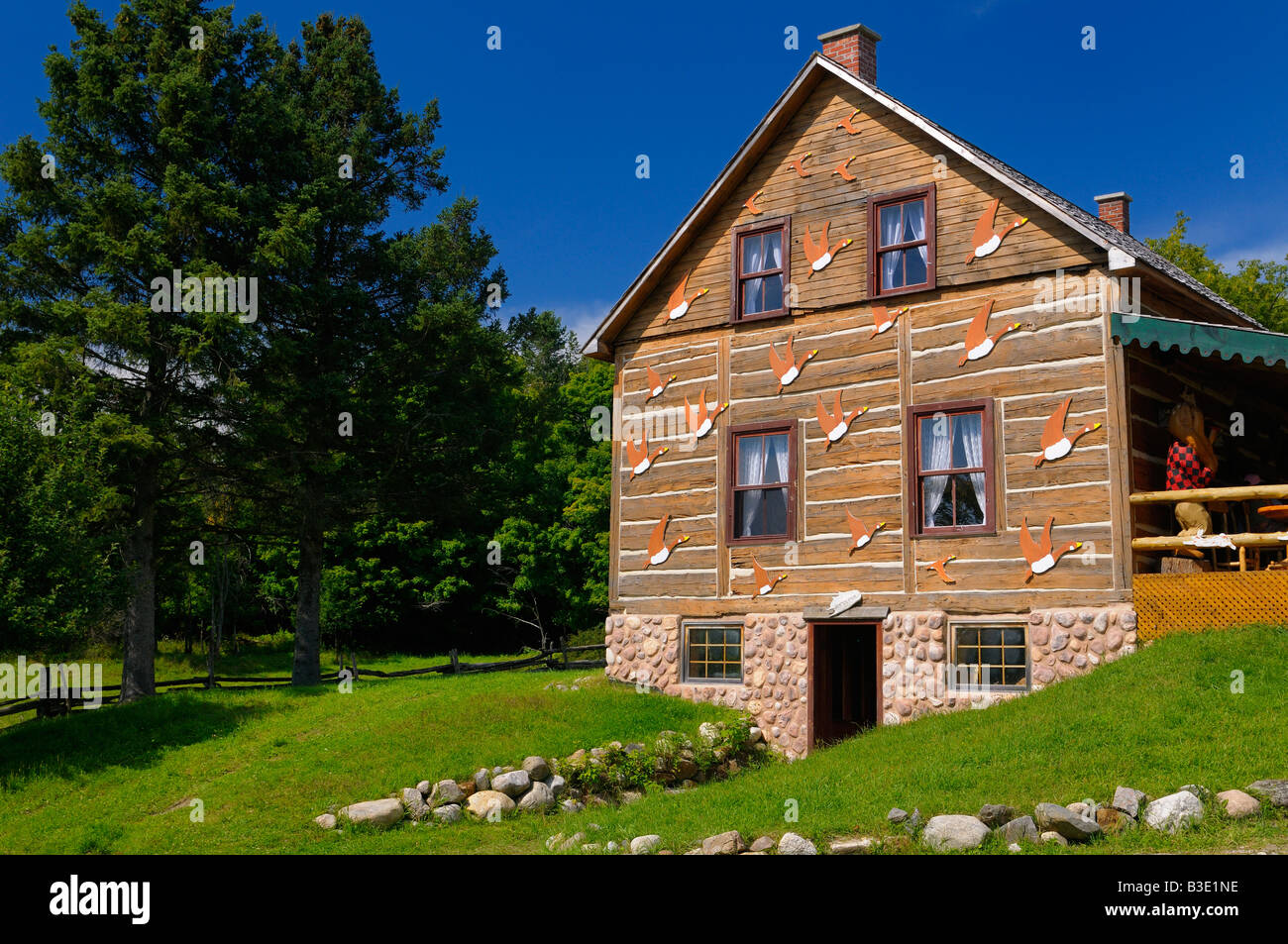 Historic French Canadian log farmhouse with Canada Geese decoration at ...