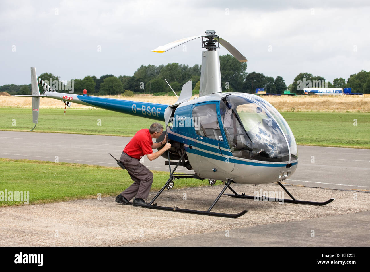 Robinson R22 Beta G-BSGF helicopter parked at Breighton Airfield and ...