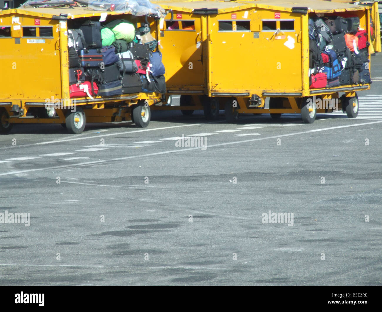 passenger luggage being transported at airport Stock Photo - Alamy