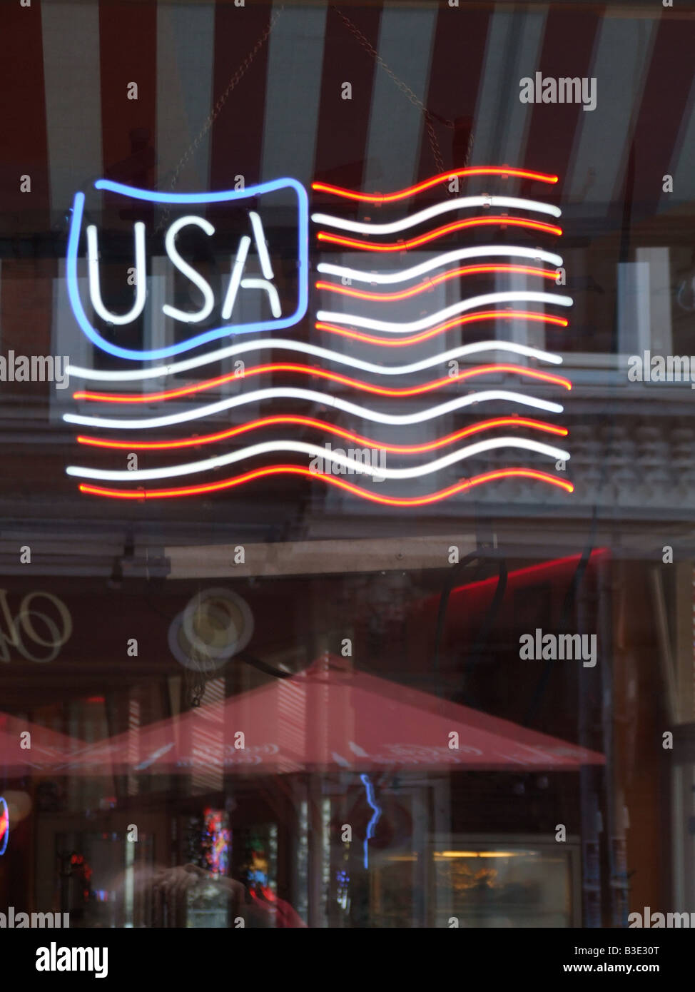 illuminated american flag neon sign in shop window Stock Photo - Alamy