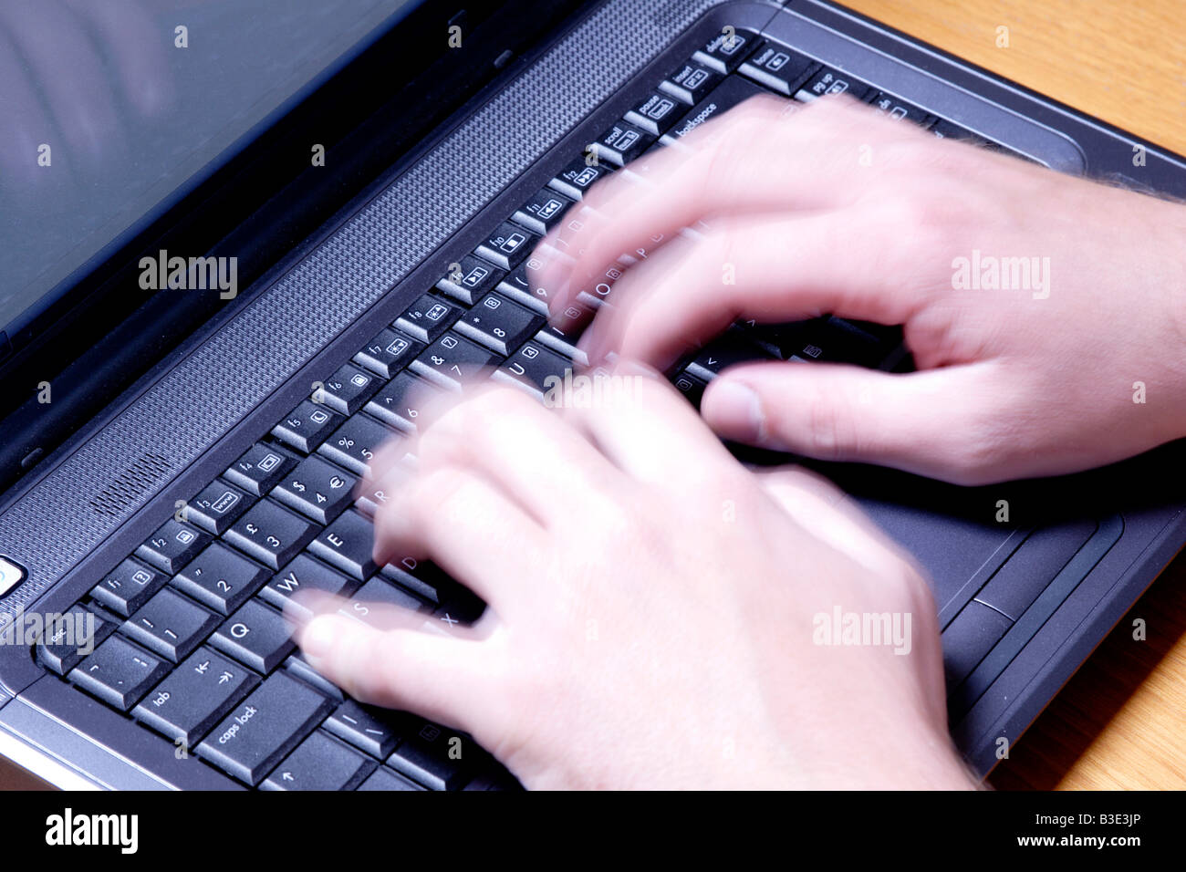 Person typing on laptop computer close up Stock Photo - Alamy