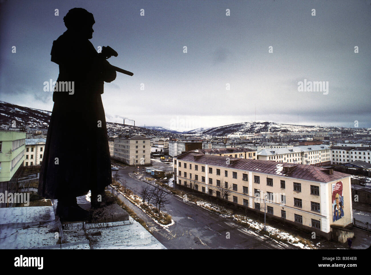 View over the Siberian port of Magadan, with statue of soldier Stock ...