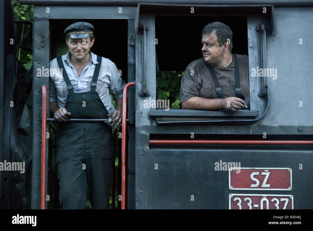 Steam train drivers on the Slovenian SZ 33-037 steam engine at Bled ...