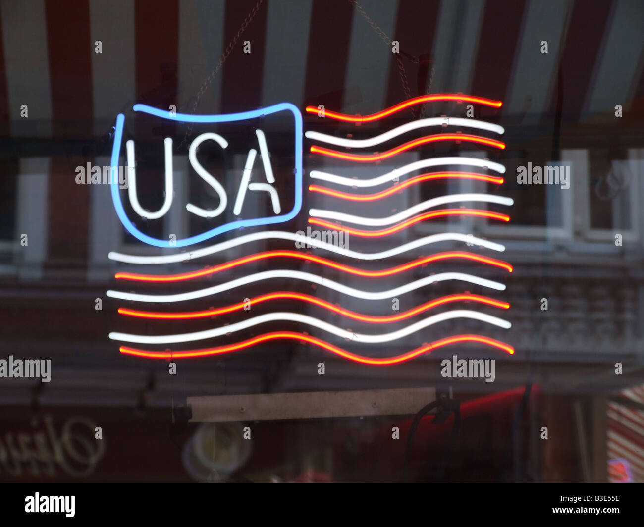 illuminated american flag neon sign in shop window Stock Photo - Alamy