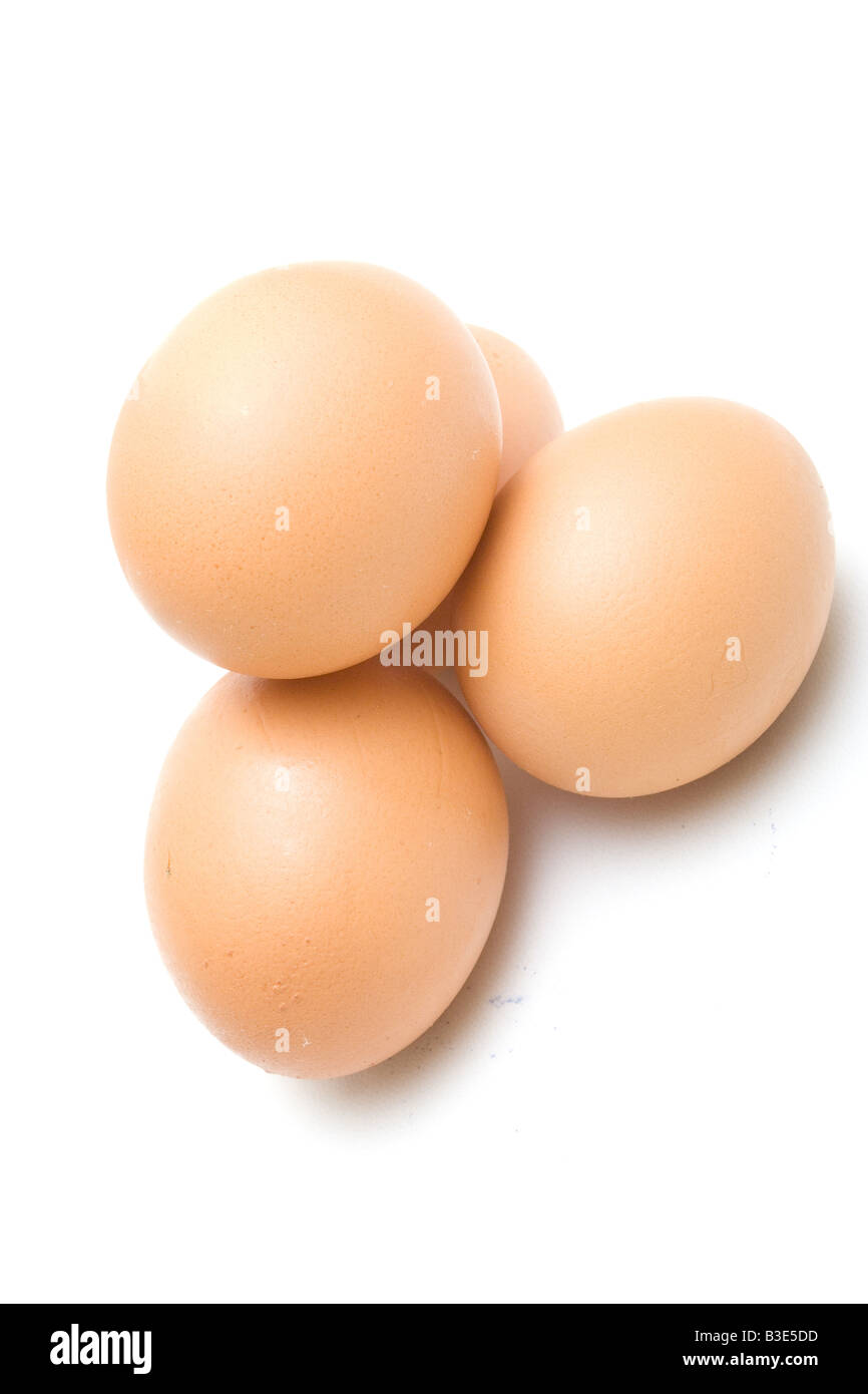 Four white organic eggs hi-res stock photography and images - Alamy