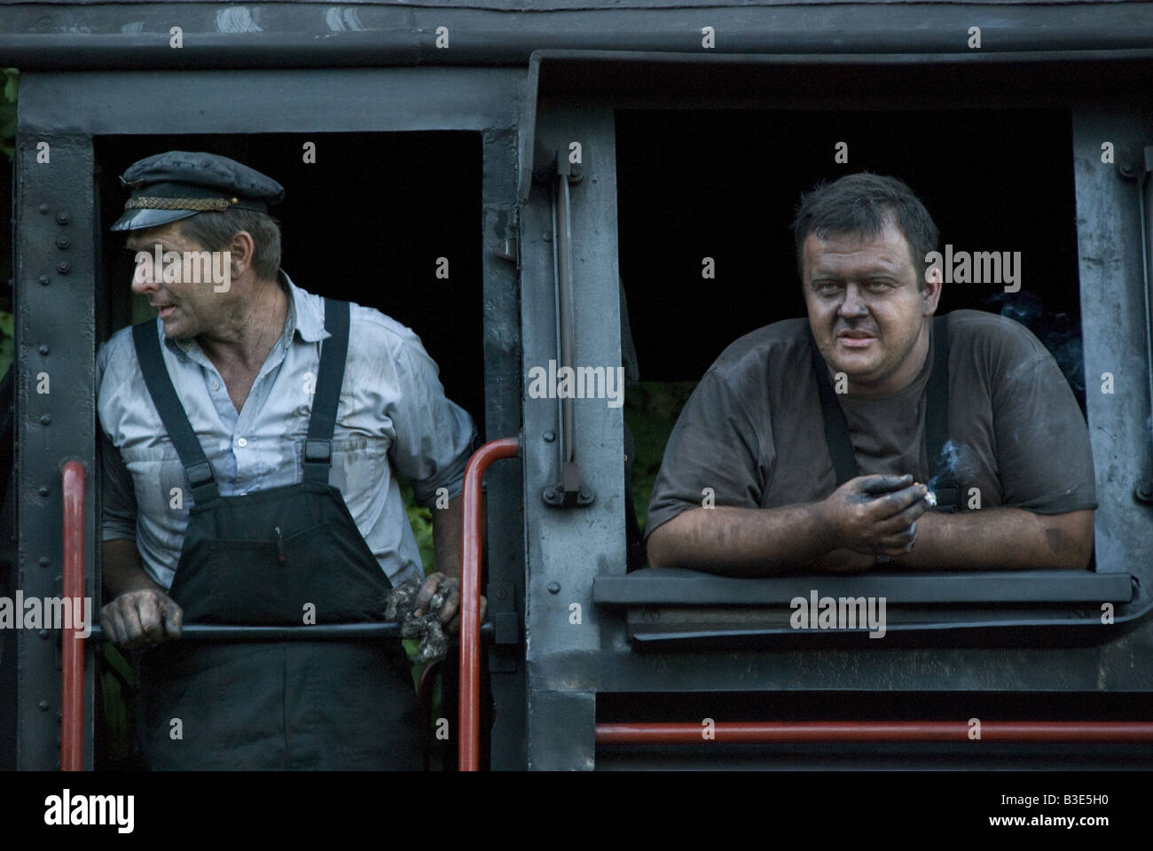 Steam train drivers on the Slovenian SZ 33-037 steam engine at Bled ...