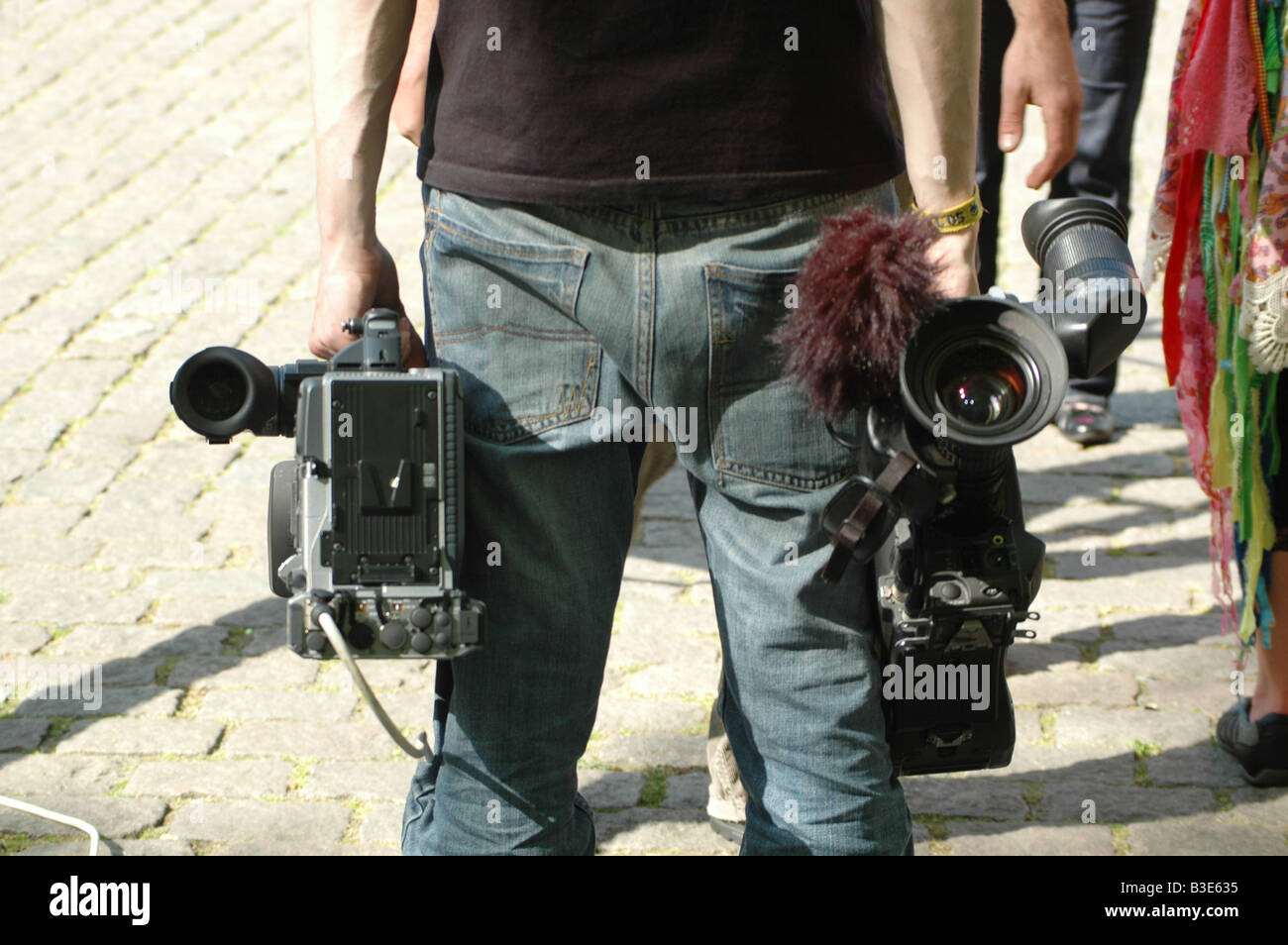 Man walking past the camera hi-res stock photography and images - Alamy