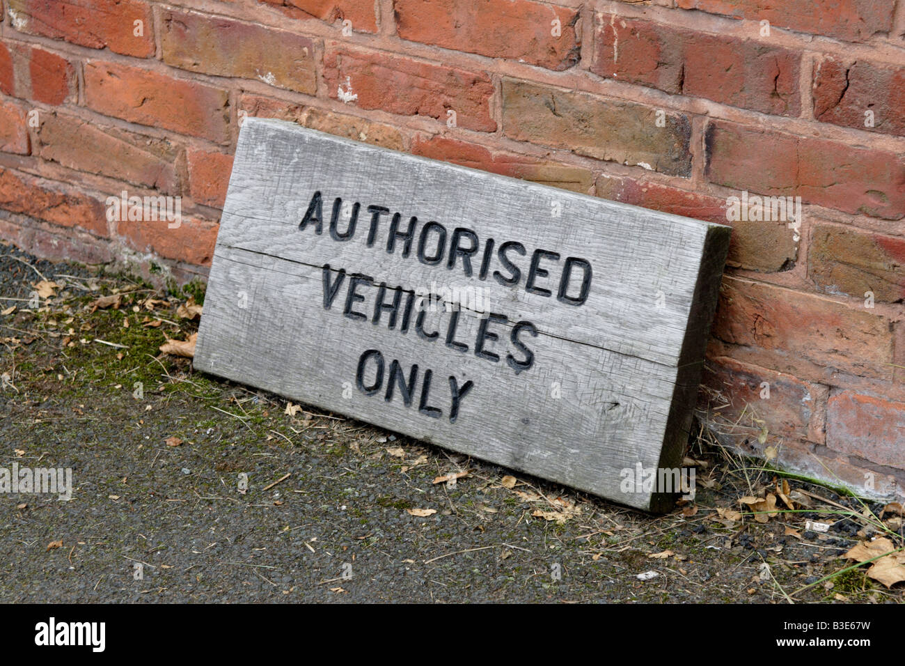 Wooden authorised vehicles only sign on driveway England UK Stock Photo ...