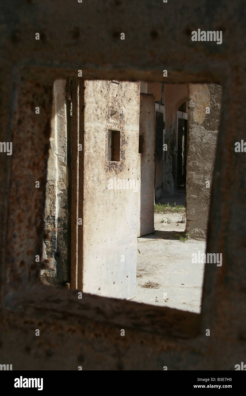 old rusty steel prison cell door in derelict jail Stock Photo - Alamy