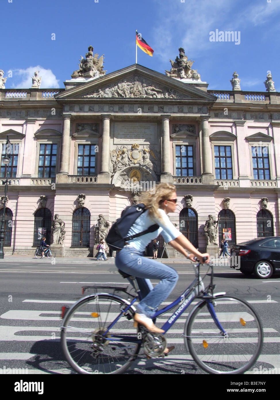 woman and bike by German Historic Museum in Berlin Stock Photo - Alamy