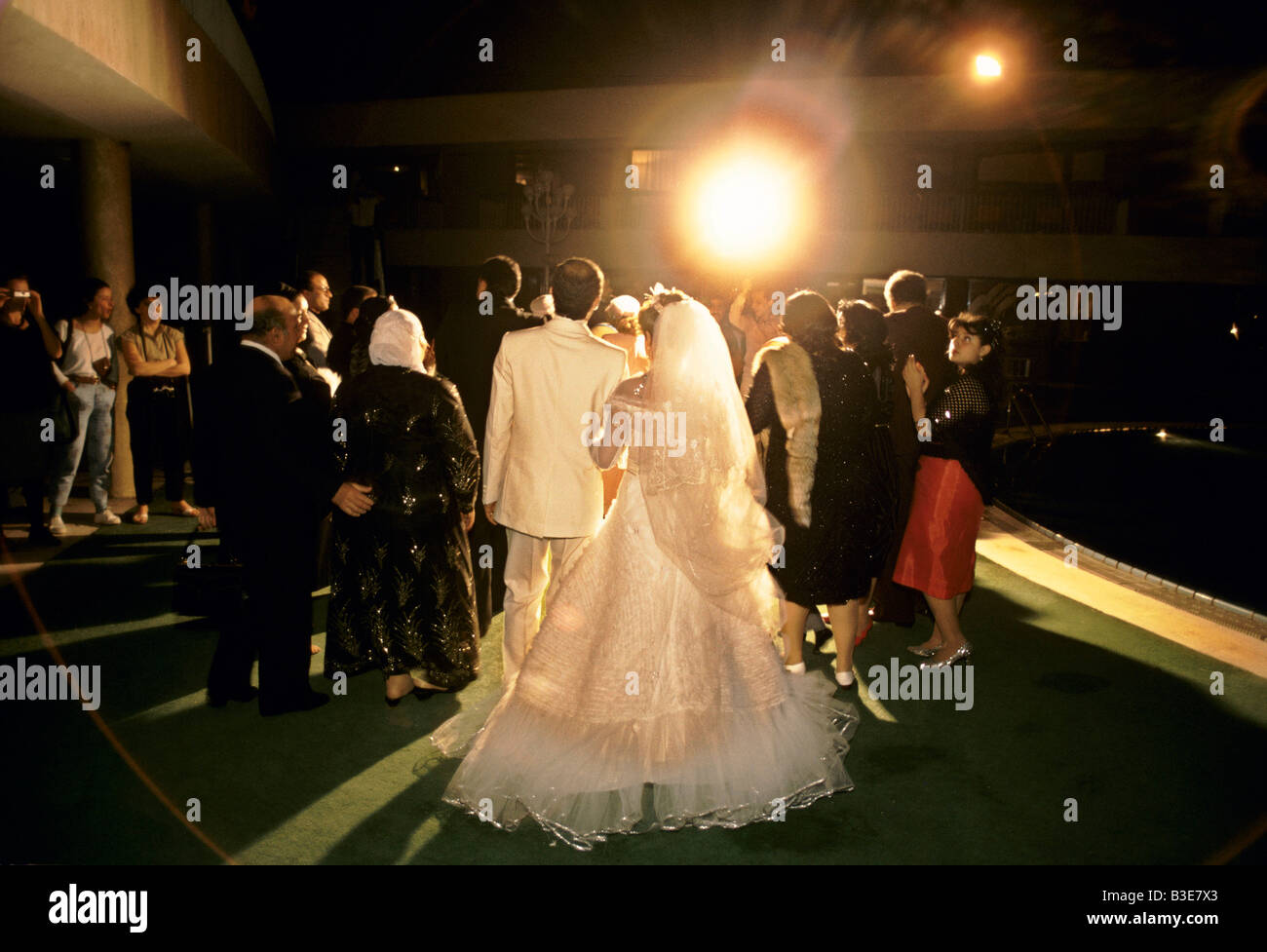 the back of a bride and groom Stock Photo - Alamy
