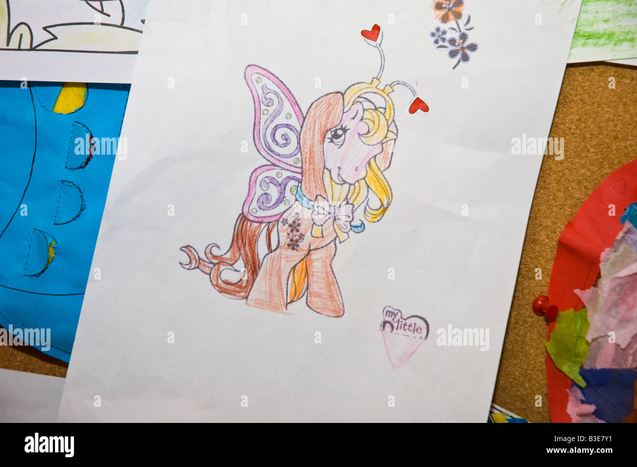pinboard filled with children drawings Stock Photo - Alamy