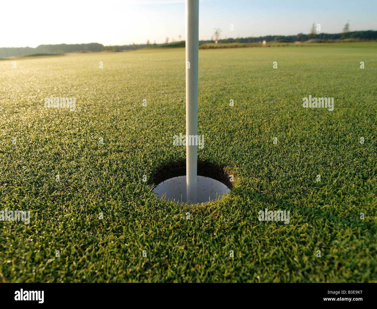 Golf course game hole target goal on green with flagpole Stock Photo ...