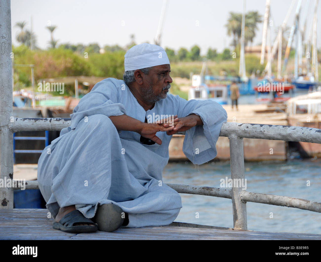 an Arab man in the harbour Stock Photo - Alamy