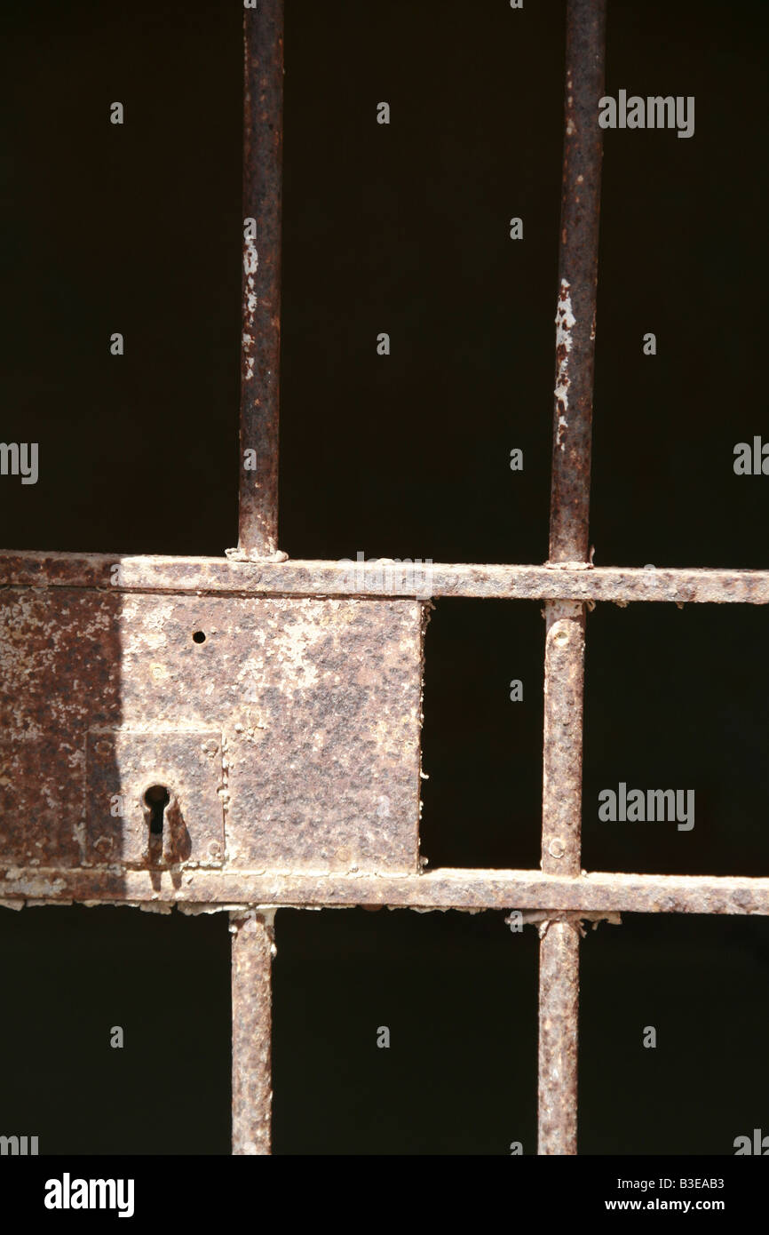 old rusty steel prison cell door in derelict jail Stock Photo - Alamy