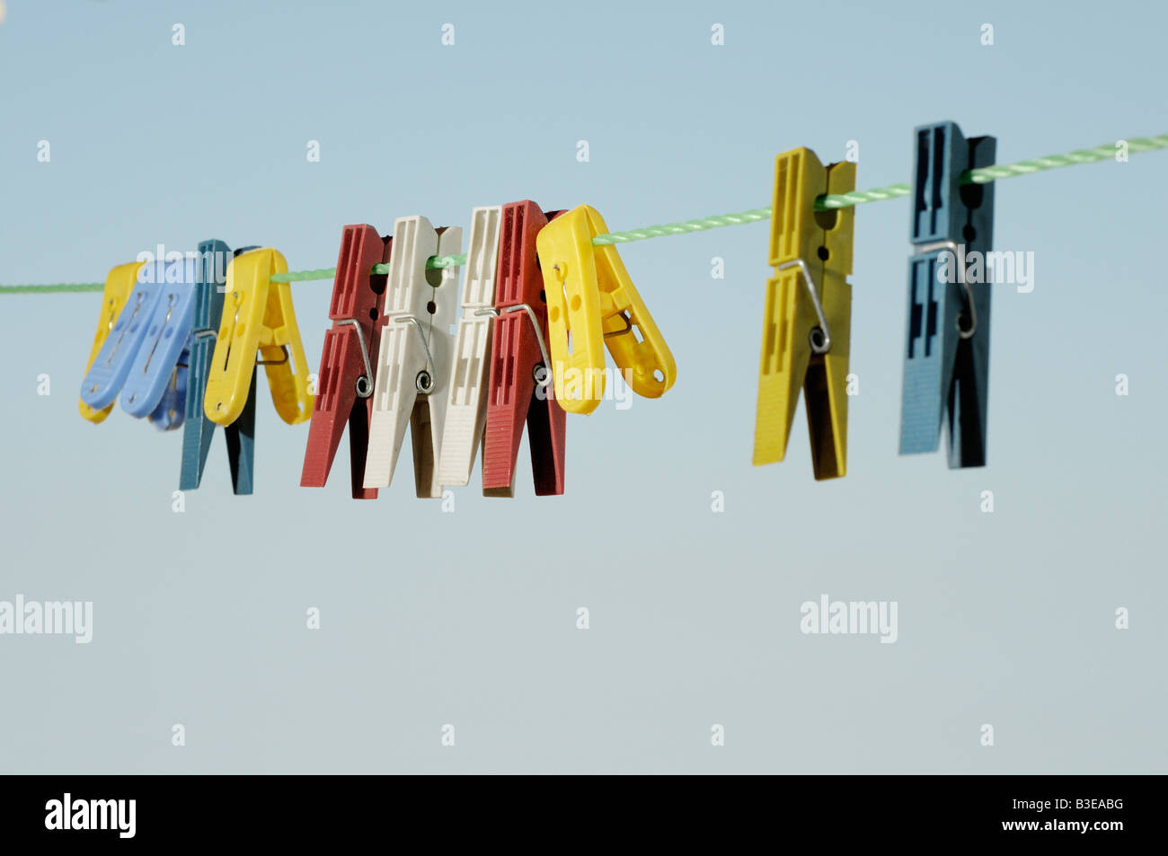 Pegs on a washing line Stock Photo - Alamy