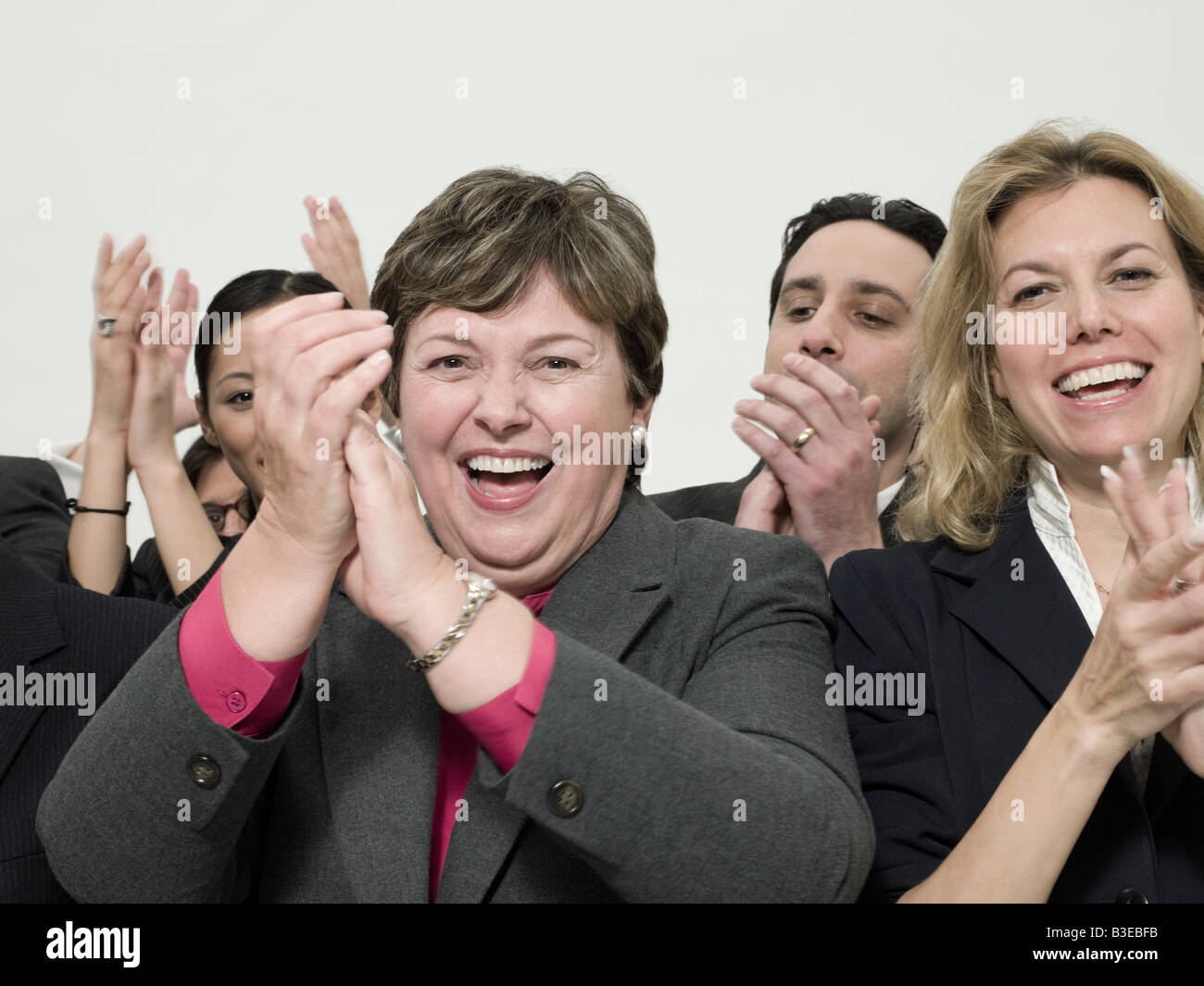 Woman clapping looking senior hi-res stock photography and images - Alamy