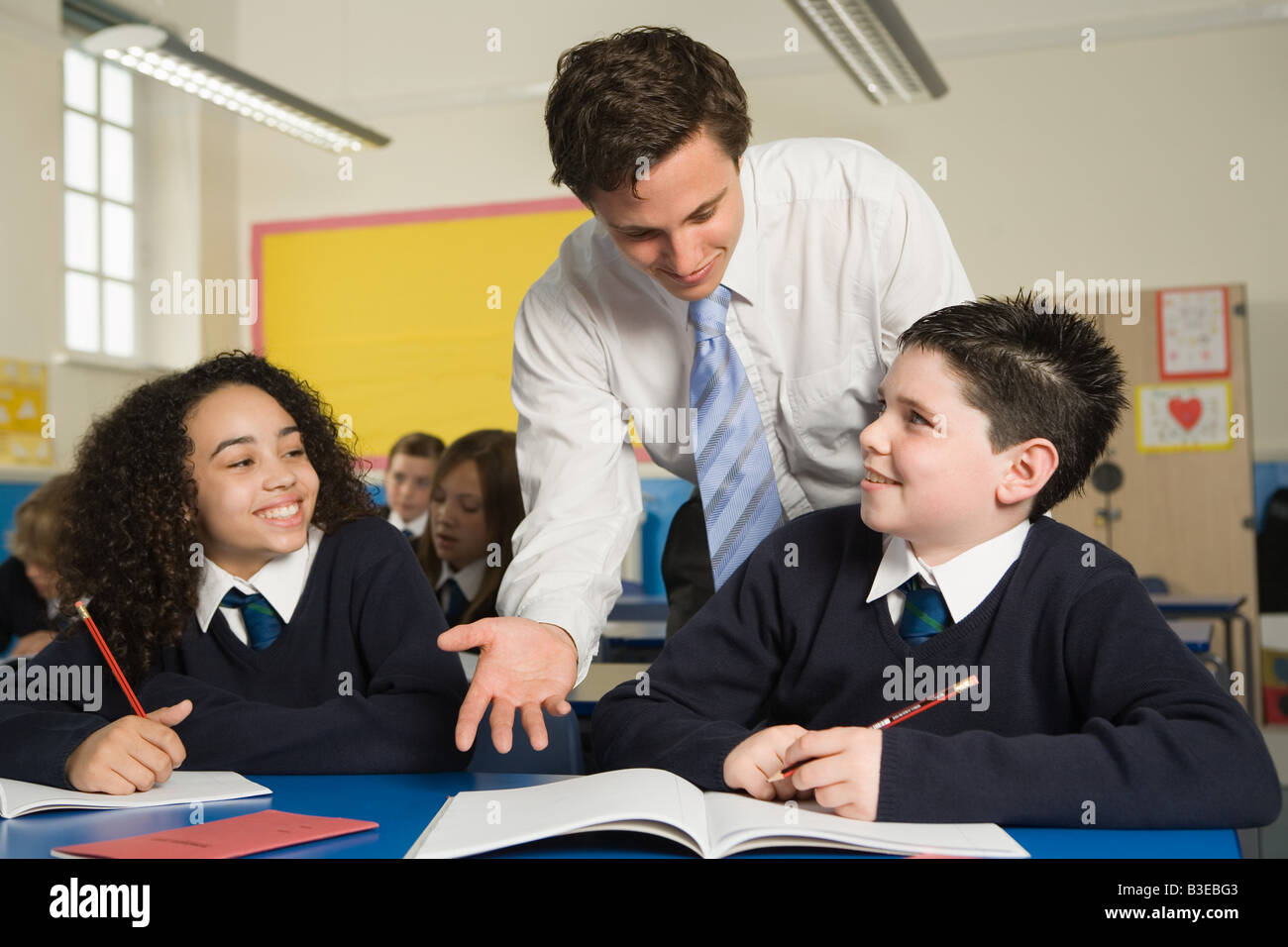 Teacher and pupils Stock Photo - Alamy