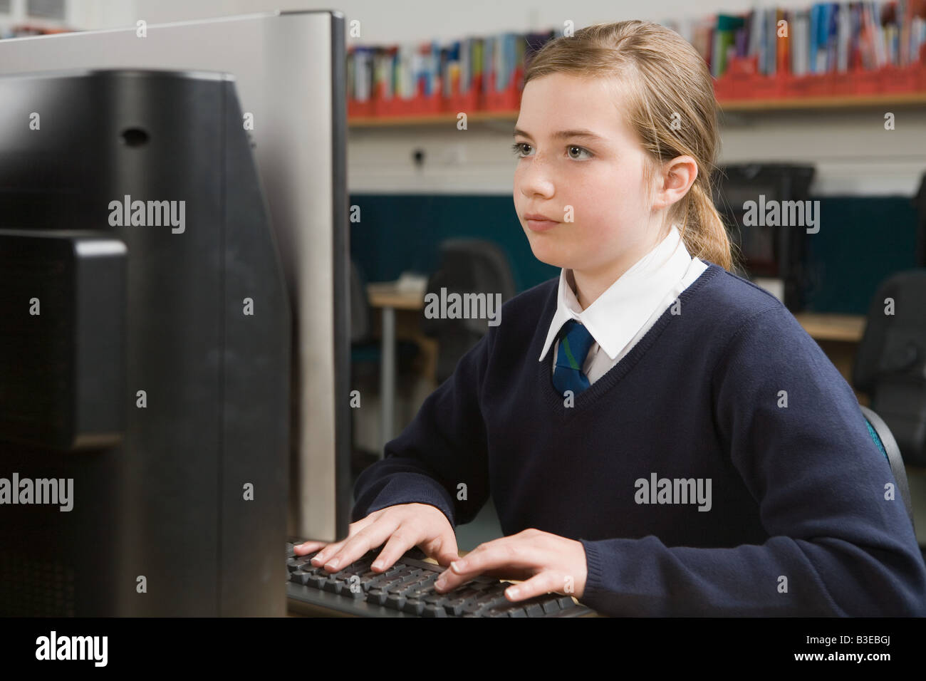 Girl using computer Stock Photo - Alamy