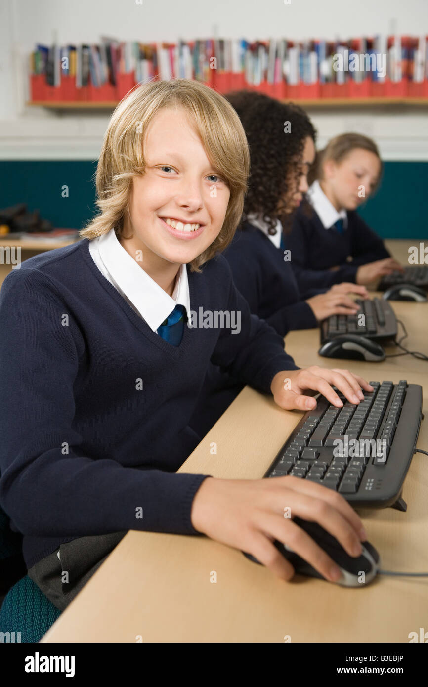 Boy at computer Stock Photo - Alamy