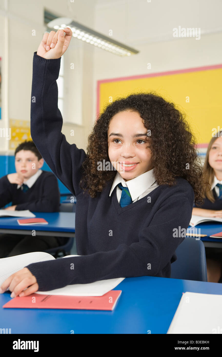 Raised hands school uniform group hi-res stock photography and images ...