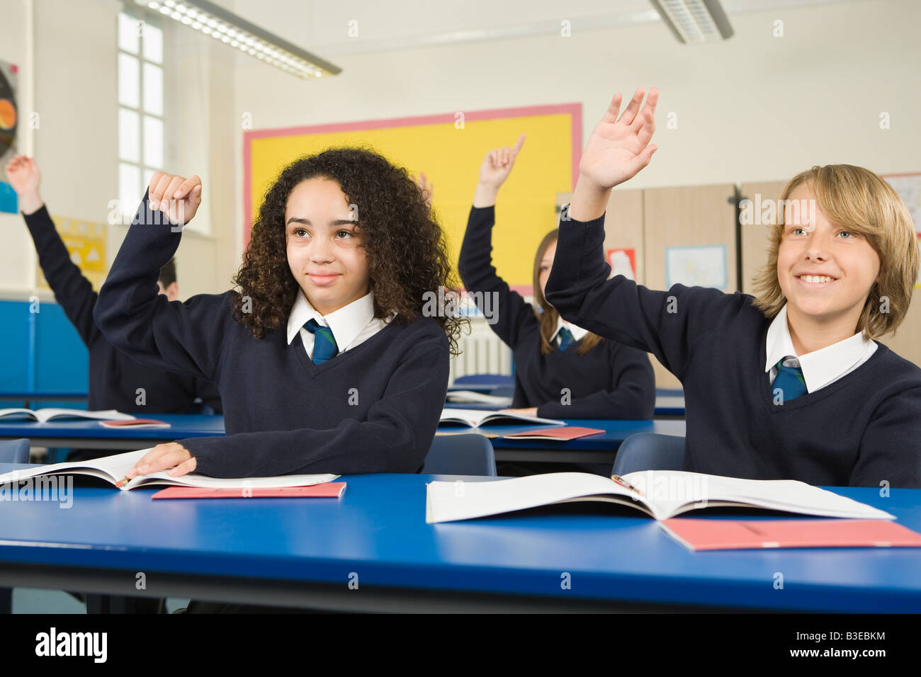 Hands Up Classroom Stock Photos & Hands Up Classroom Stock Images - Alamy