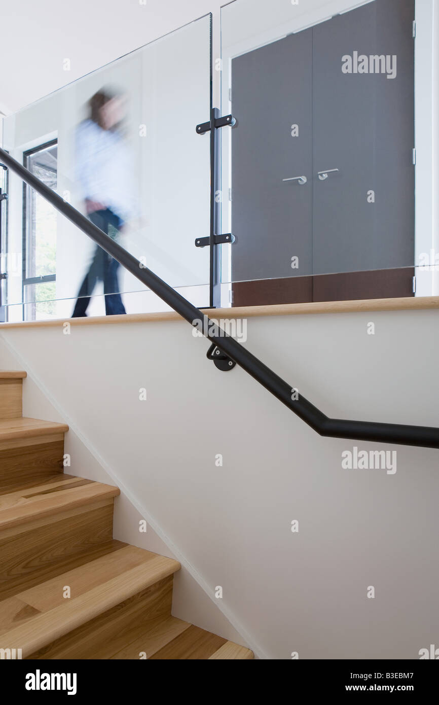 Person walking in house Stock Photo - Alamy