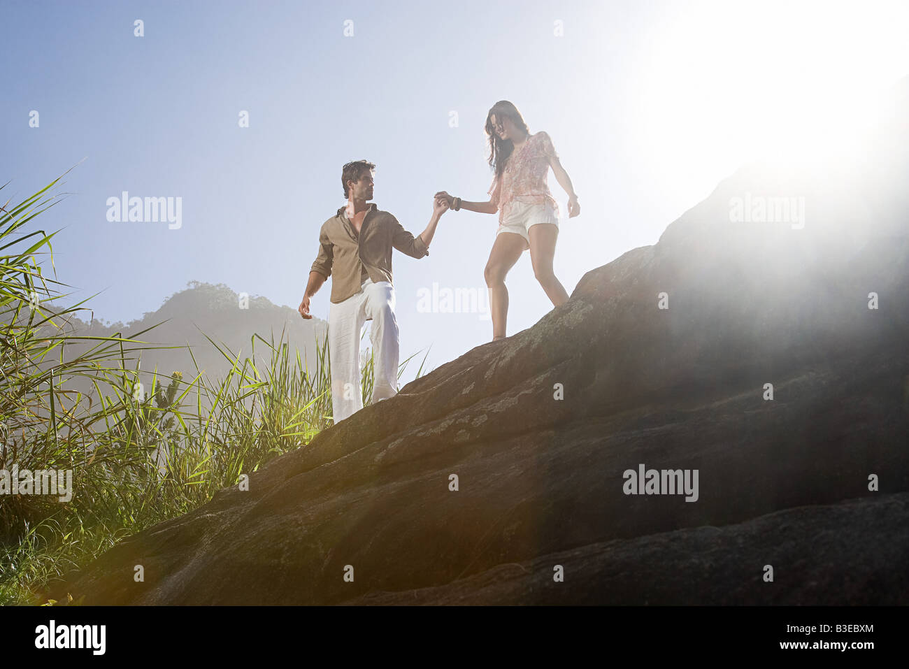 People walking on rocks hi-res stock photography and images - Alamy