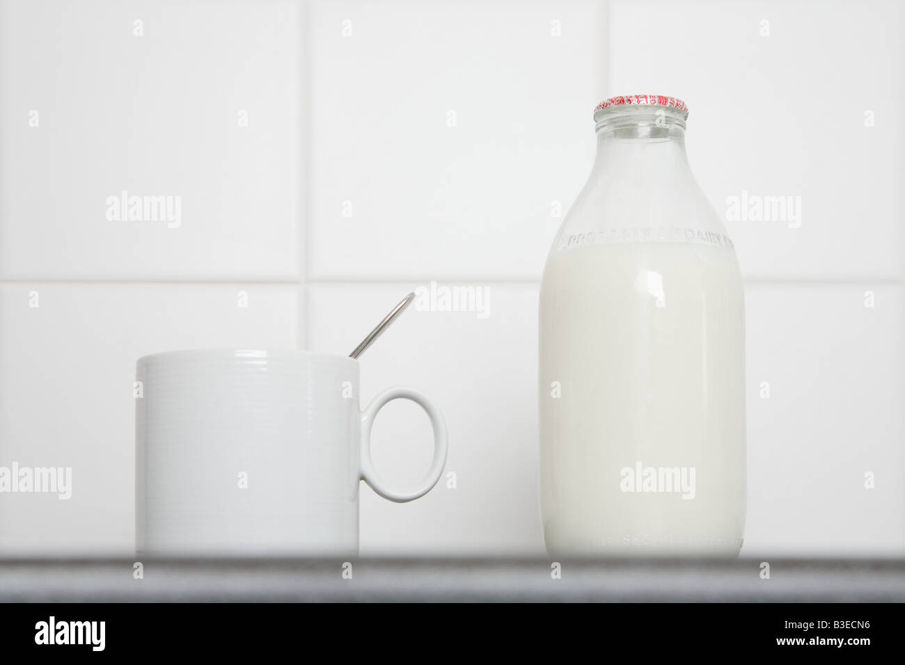 Coffee cup and milk Stock Photo - Alamy