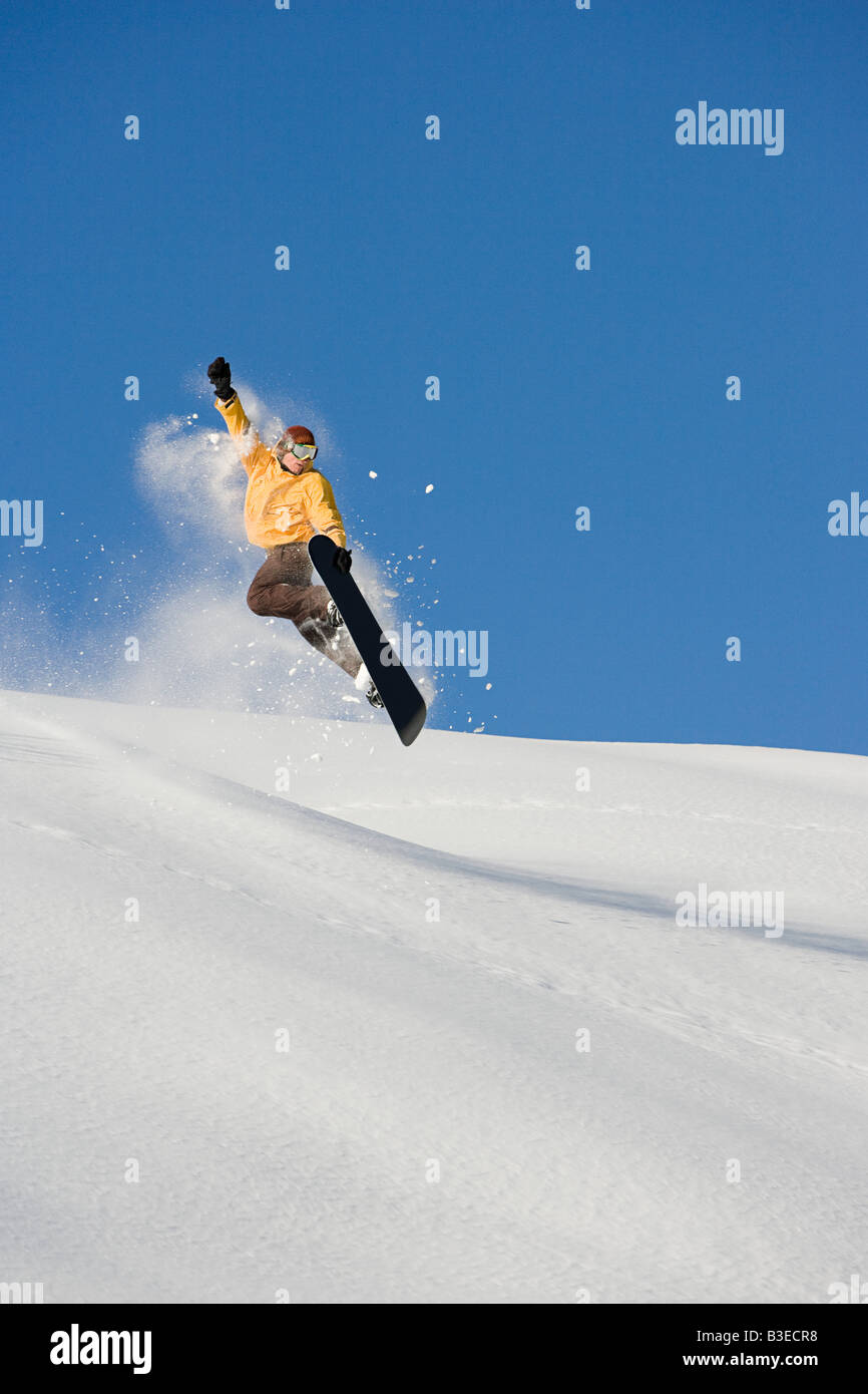 A man snowboarding Stock Photo - Alamy