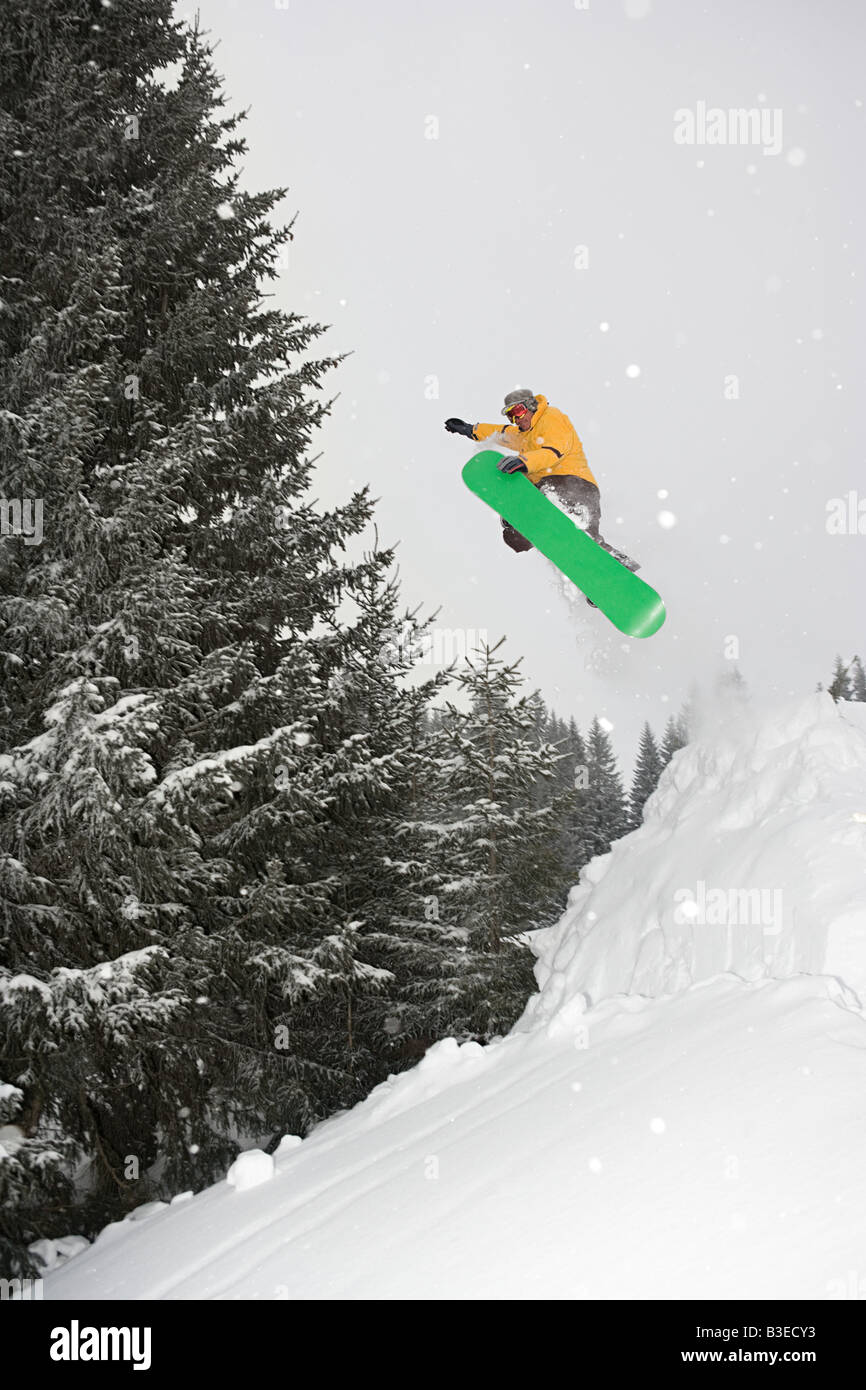 A man snowboarding Stock Photo - Alamy