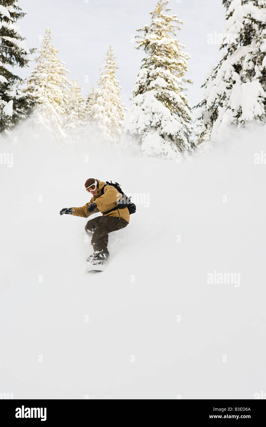 A man snowboarding Stock Photo - Alamy