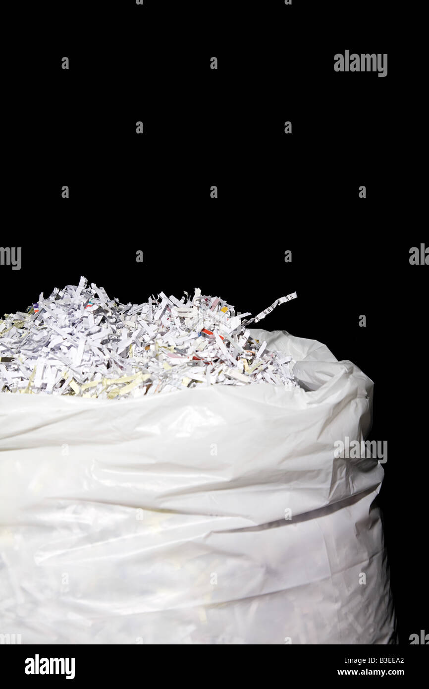 Bag full of shredded documents Stock Photo - Alamy