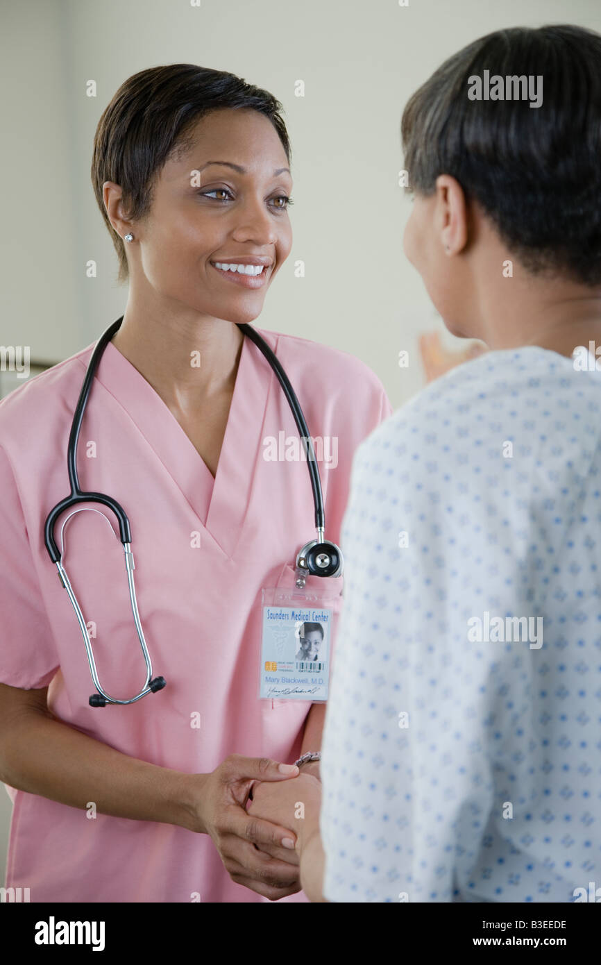 Looking after patient patients hi-res stock photography and images - Alamy