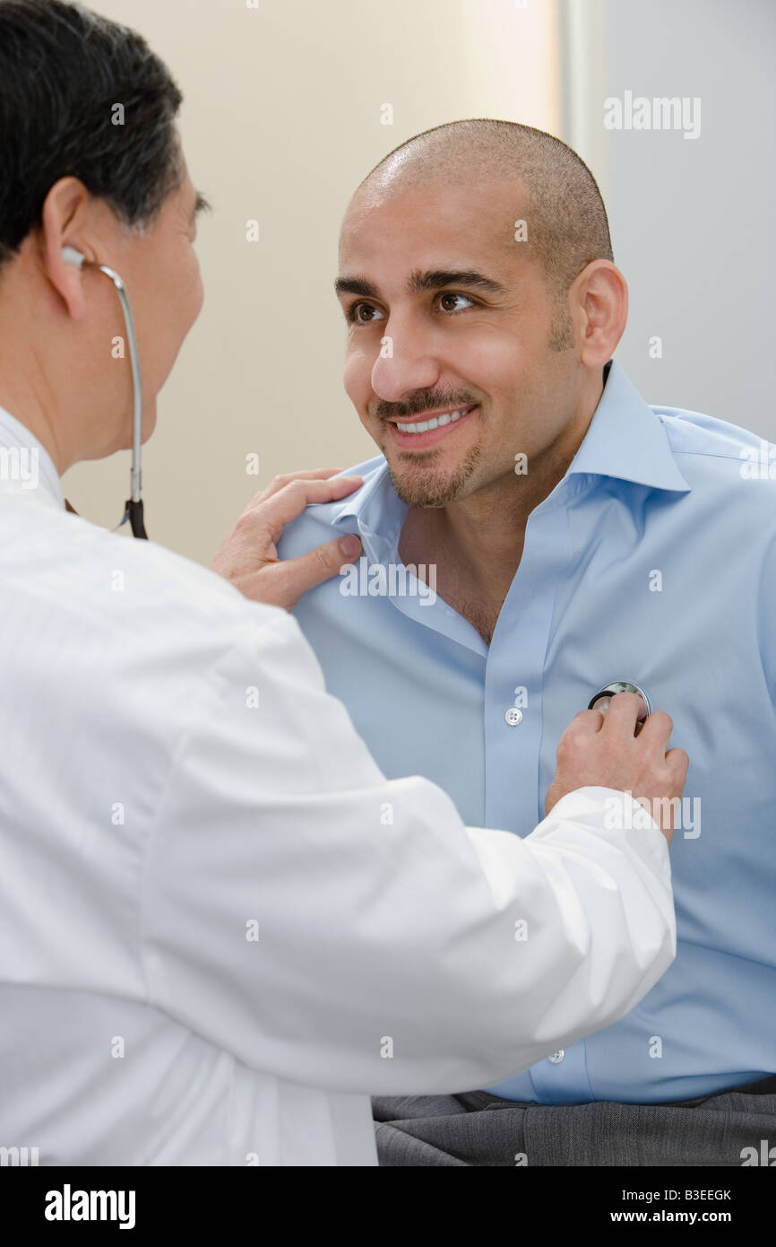 Doctor Examining Patient Stethoscope Mid High Resolution Stock ...