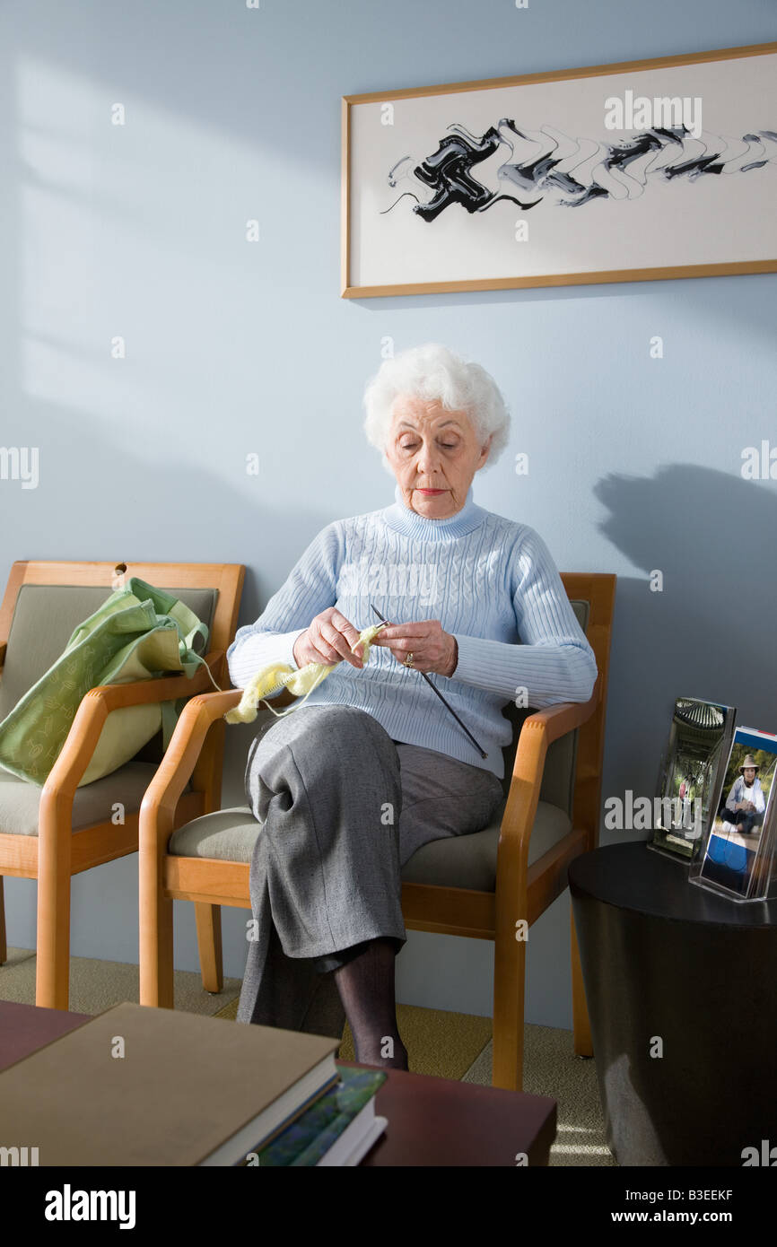 A senior woman waiting in a doctors office Stock Photo - Alamy