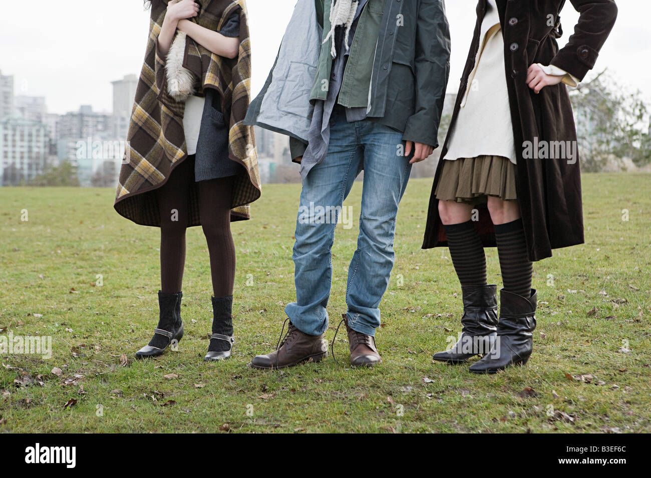 People standing in field Stock Photo - Alamy
