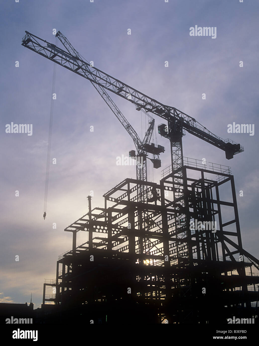 Cranes and construction frame Stock Photo - Alamy