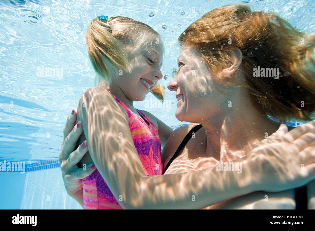 Mother Daughter Swimming Pool High Resolution Stock Photography and ...