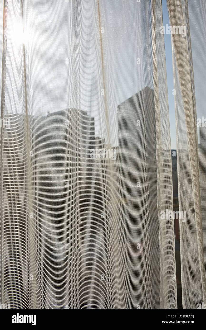 Sunlight on net curtain Stock Photo - Alamy