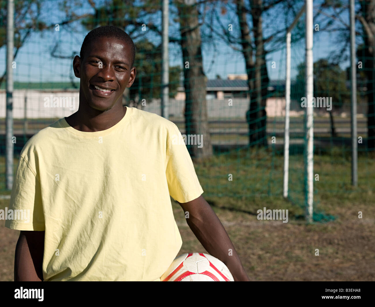 Smiling footballer hi-res stock photography and images - Alamy