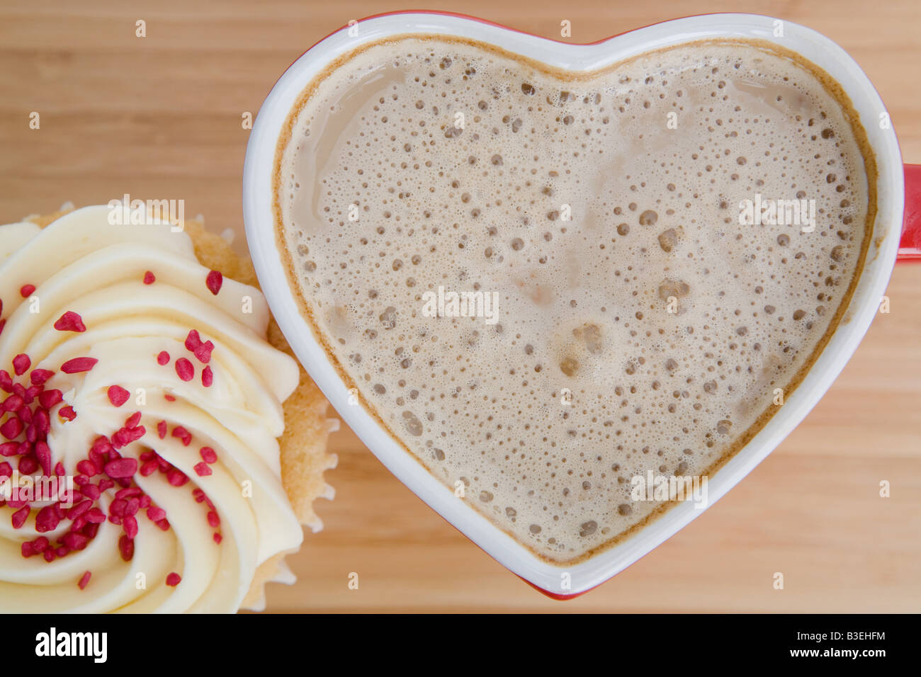 Coffee in a heart shaped cup Stock Photo - Alamy