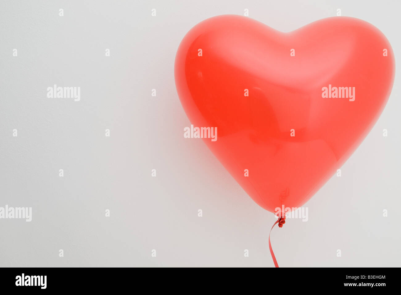 Heart shaped balloon Stock Photo - Alamy