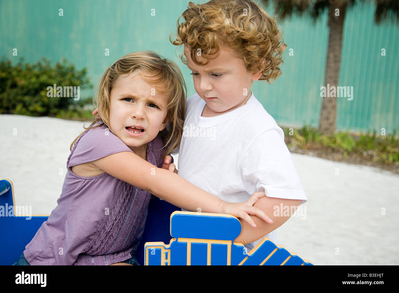 Sister and brother fighting Stock Photo - Alamy