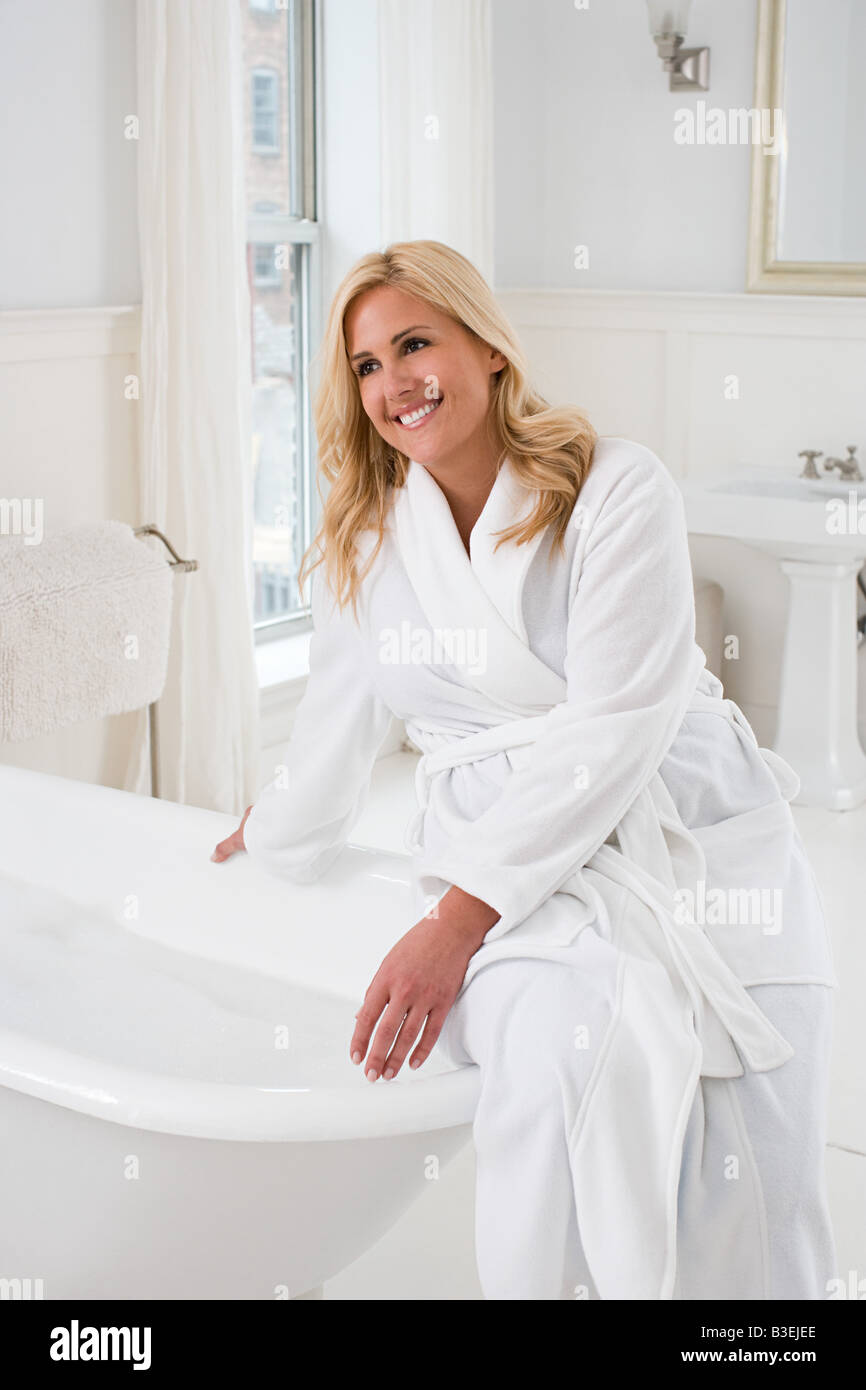 A woman running a bath Stock Photo - Alamy