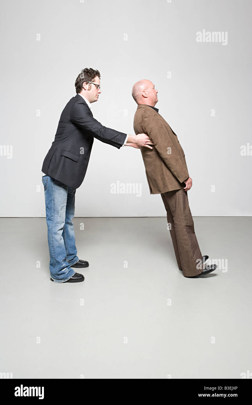 Man catching man Stock Photo - Alamy