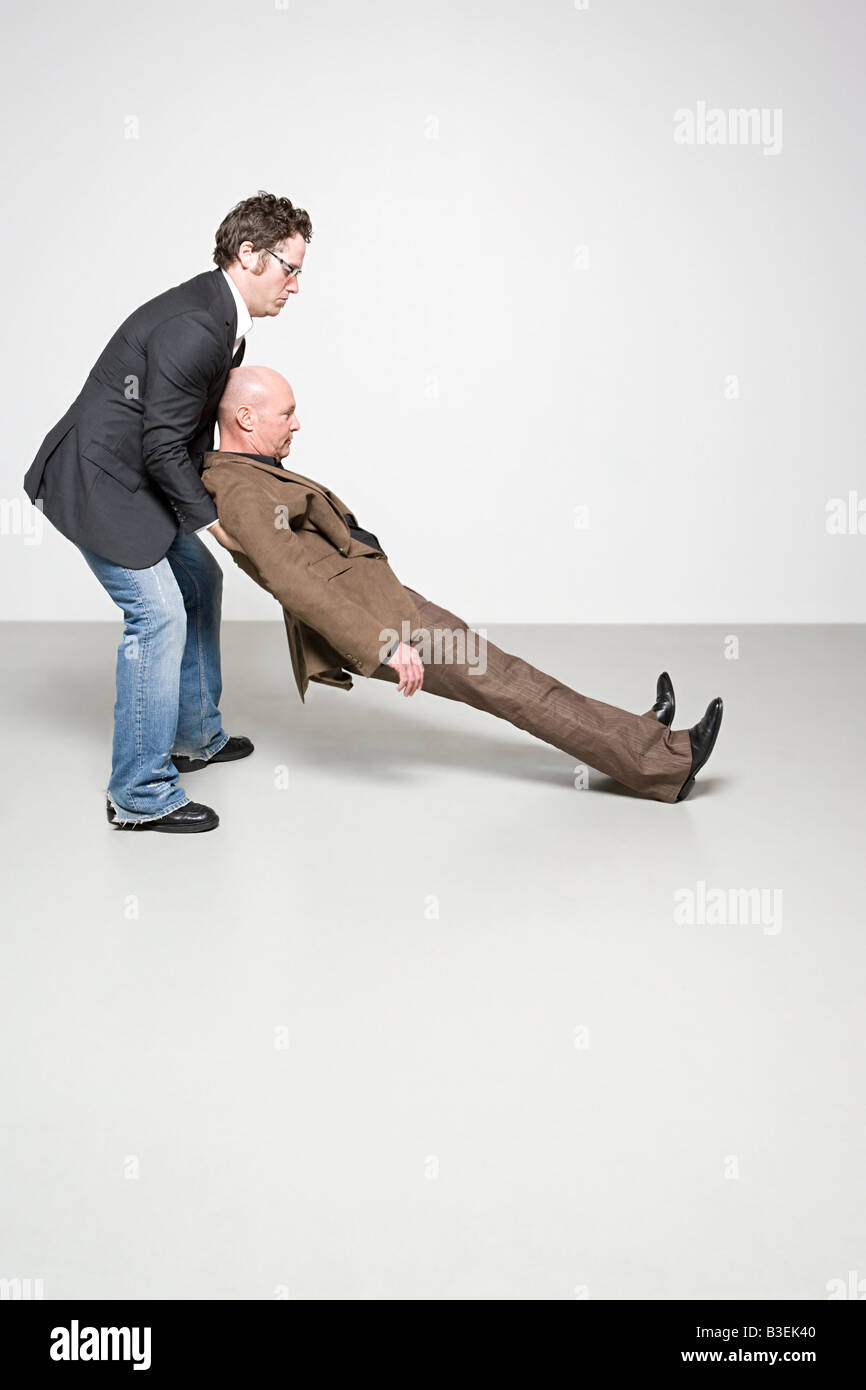 Man catching man Stock Photo - Alamy