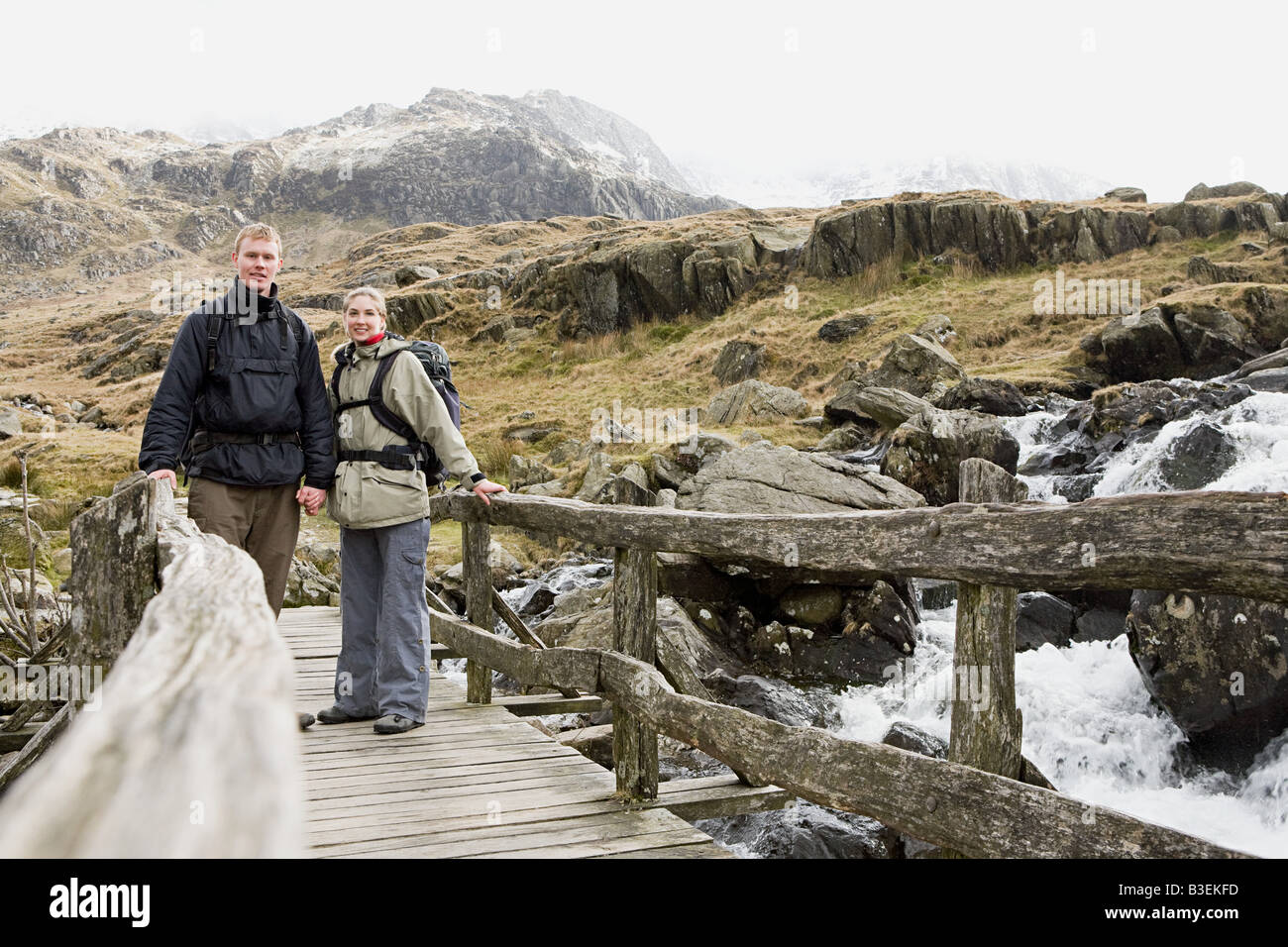 People standing on a bridge hi-res stock photography and images - Alamy