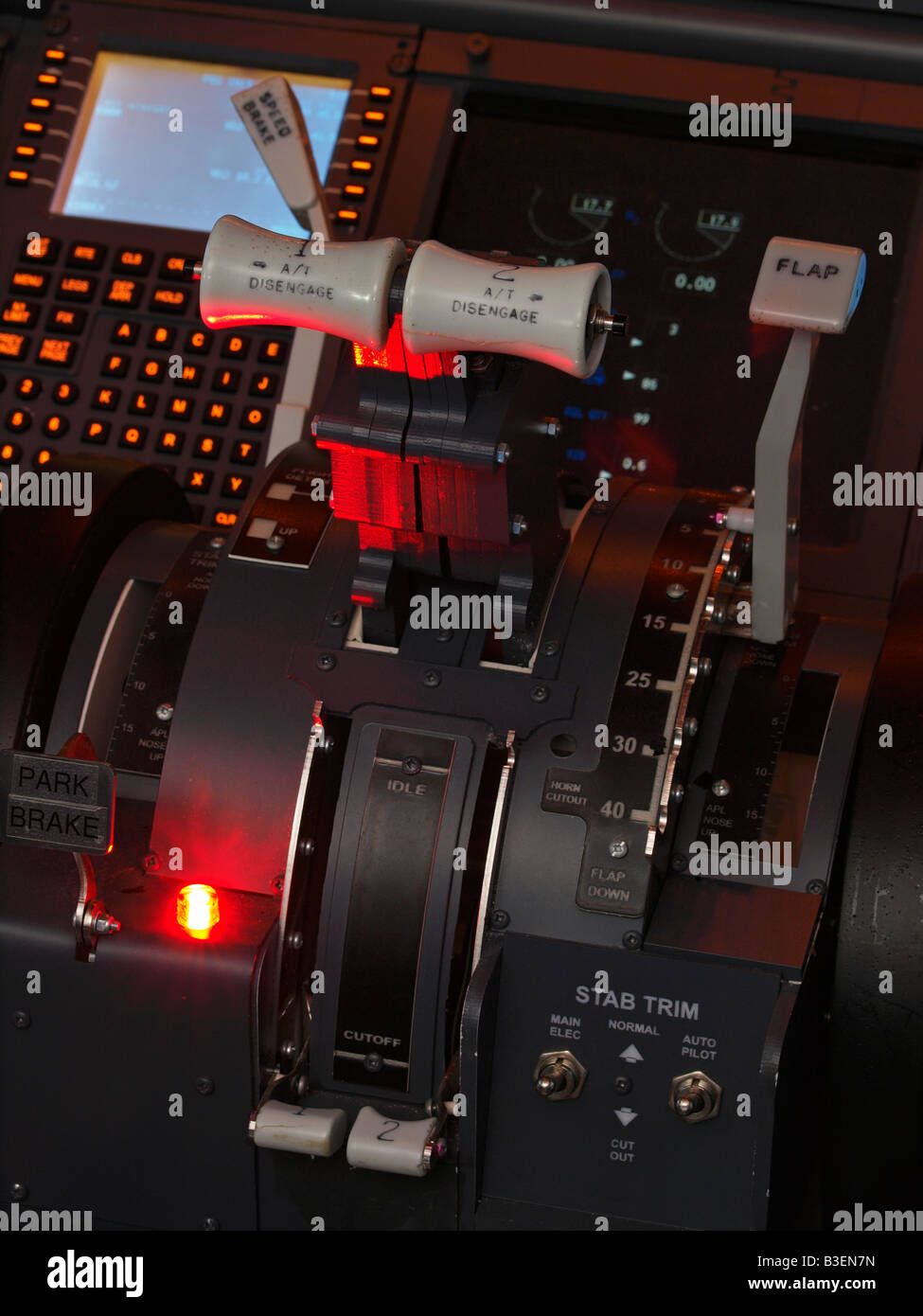 Boeing 737 throttle handles illuminated photographed in a simulator ...