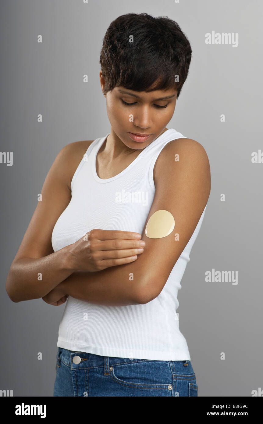 Arm bandaid woman hi-res stock photography and images - Alamy